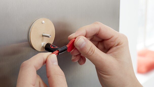 Wall mounted wire rack - mounting without drilling - tesa